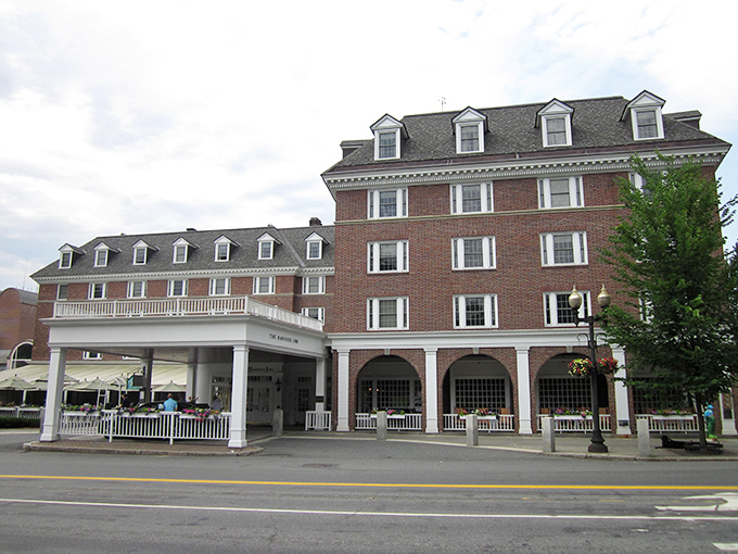 The Hanover Inn: where New England tradition meets boutique hotel comfort. The front porch practically begs you to sip something warm while judging passing fashion choices.