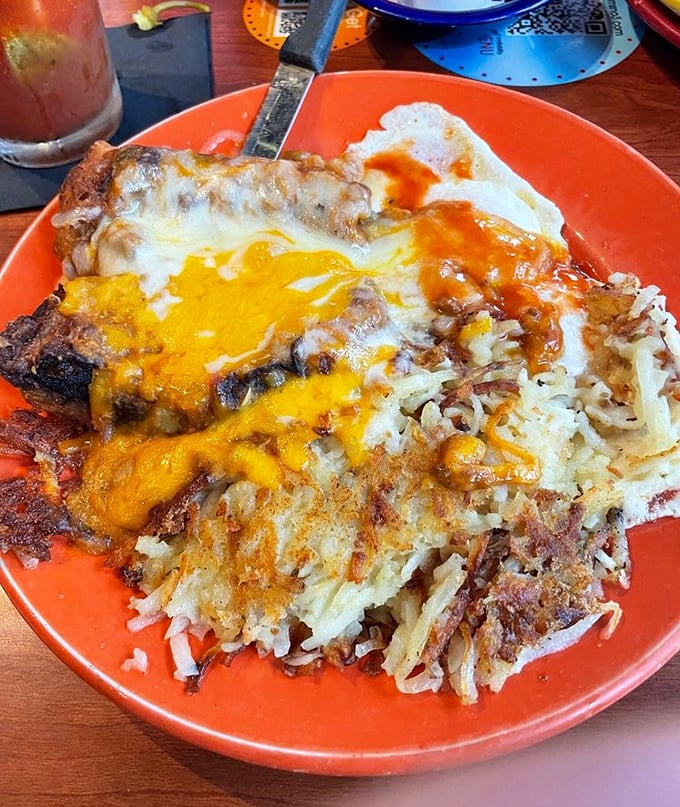 The holy trinity of breakfast: crispy hash browns, melted cheese, and that famous green chili. Diet plans, consider yourselves postponed.