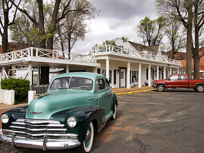 Classic Americana with a vintage twist—this historic building with its mint-green vintage car could be a time machine to simpler days.
