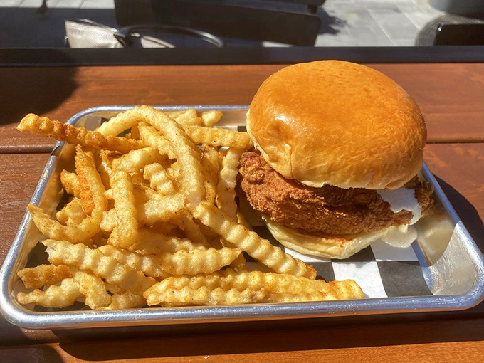 The classic chicken sandwich gets the royal treatment&mdash;crispy exterior, pillowy bun, and those waffle fries deserve their own fan club.