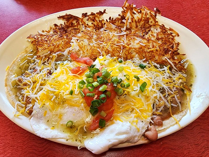Huevos Rancheros: where cheese stretches to infinity, hash browns achieve golden perfection, and your diet plan waves a tiny white flag.