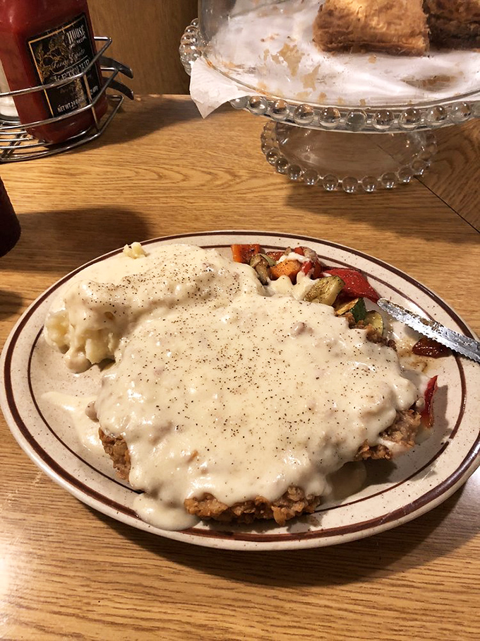 This isn't just chicken fried steak&mdash;it's a gravy-laden monument to the art of comfort food that requires both a hearty appetite and possibly elastic waistbands.