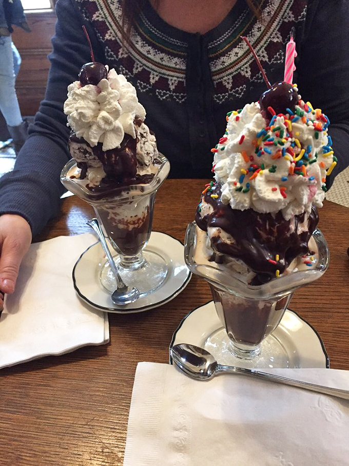 Twin towers of frozen delight that make skyscrapers jealous. One with cherries, one with sprinkles&mdash;both worth the brain freeze. 