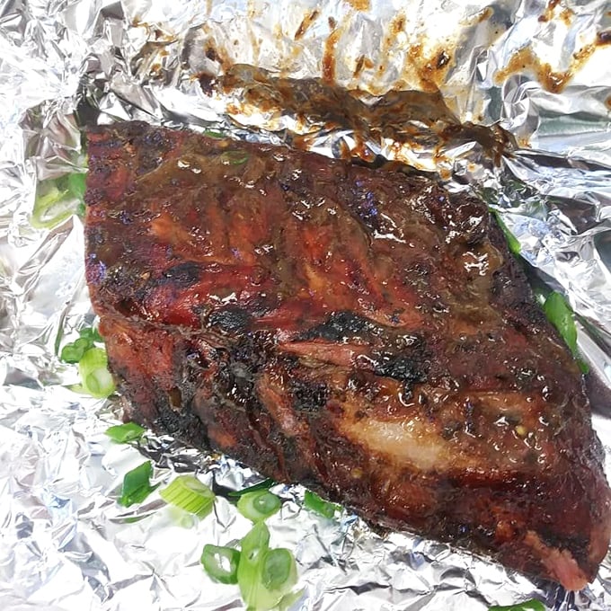 Meat candy on aluminum foil&mdash;this brisket has the kind of smoke ring that would make a Texan tip their hat in respect.