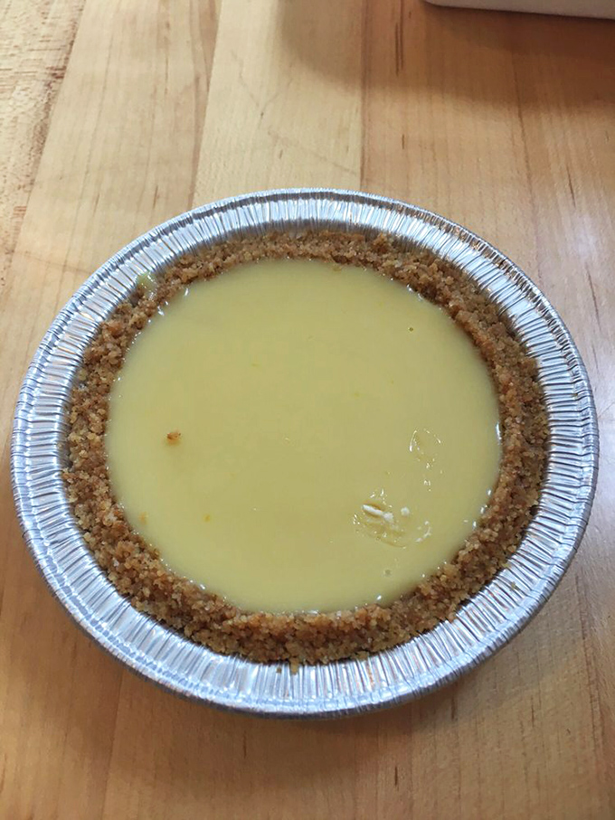 Behold the naked beauty of key lime perfection. That golden yellow filling against the graham cracker crust is nature's most perfect color combination.