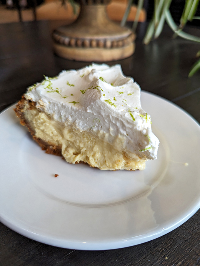 That moment when the whipped cream-to-filling ratio achieves mathematical perfection. Key lime geometry at its finest.