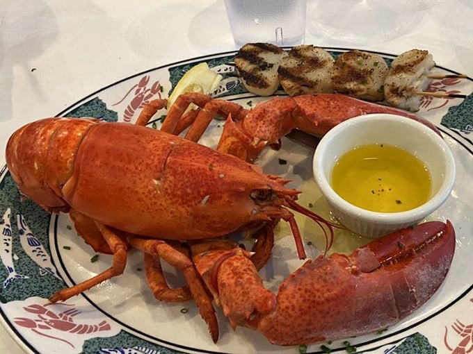 When lobster and scallops share a plate, it's like ocean royalty holding court. The butter serves as their golden throne.