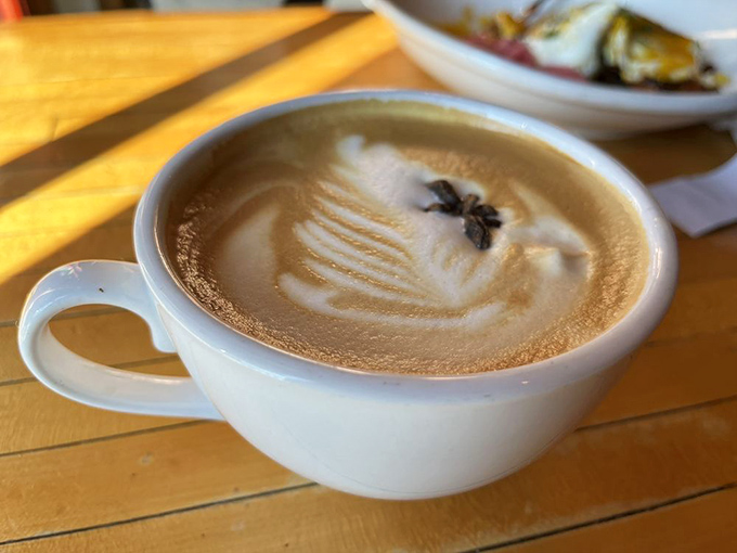 That star anise floating atop creamy foam isn't just garnish – it's the coffee equivalent of putting a tiny hat on a cat. Delightful and unexpected.