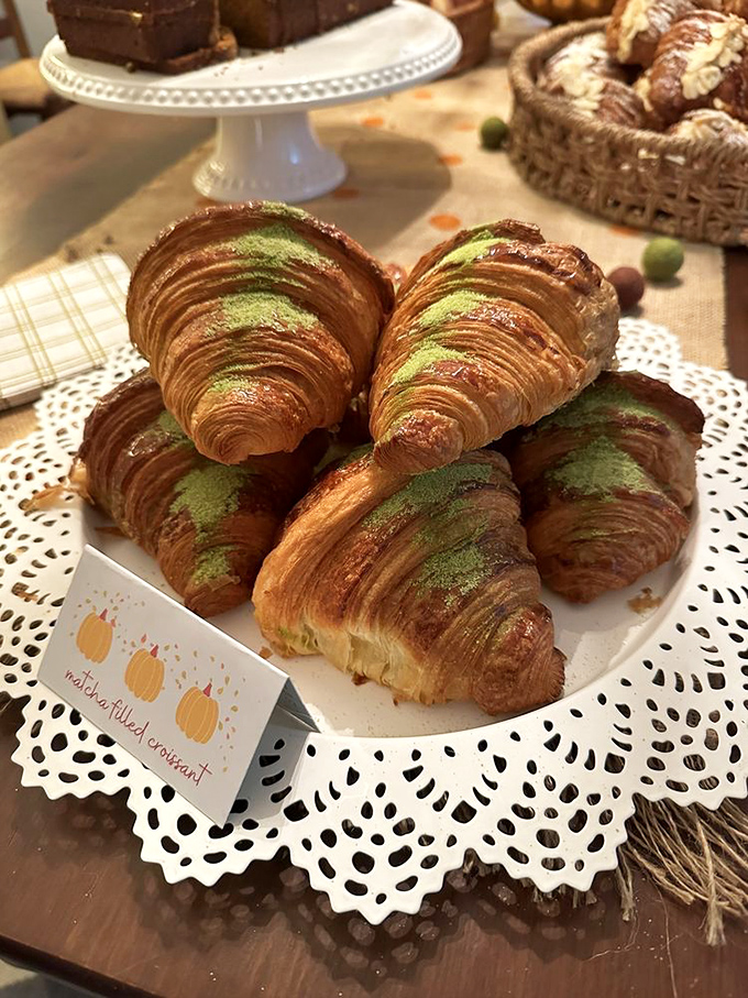 These matcha croissants aren't just breakfast—they're edible art with their vibrant green streaks cutting through golden, flaky layers.