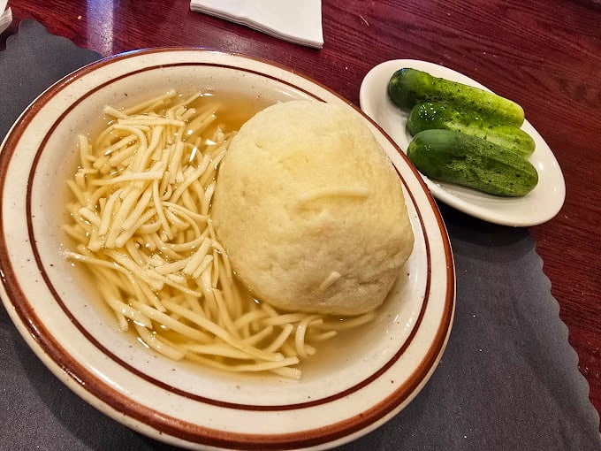 Clear broth with thin noodles and a matzo ball so substantial it deserves its own ZIP code.