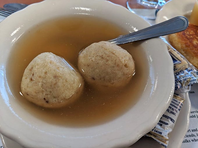 The perfect matzo ball doesn't sink or float too much&mdash;it's the Goldilocks of dumplings, just right for sopping up that liquid gold broth.