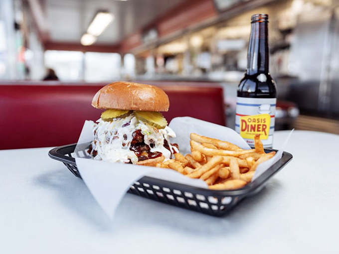 This burger looks like it's auditioning for a food commercial, with cheese melting like a Salvador Dal&iacute; painting and fries standing by for moral support.