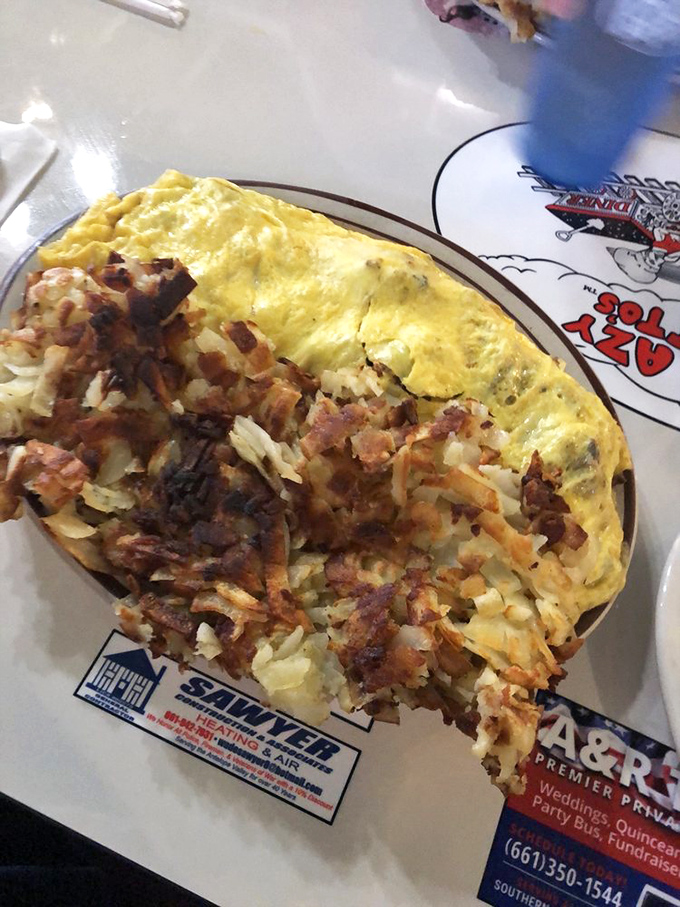 This isn't just breakfast&mdash;it's breakfast with ambition. Crazy Otto's omelets arrive with a side of "good luck finishing this before lunch."