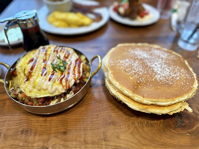 This isn't just a pancake stack; it's breakfast architecture that manages to be both cloud-like and substantially satisfying.