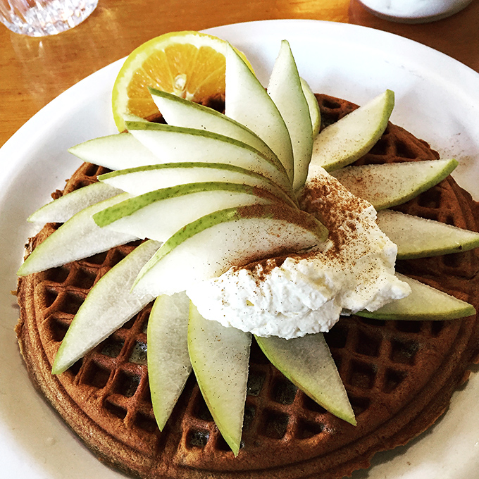 The green apple waffle is edible architecture&mdash;precise slices arranged like a modernist sculpture, with cinnamon dust for artistic flair.