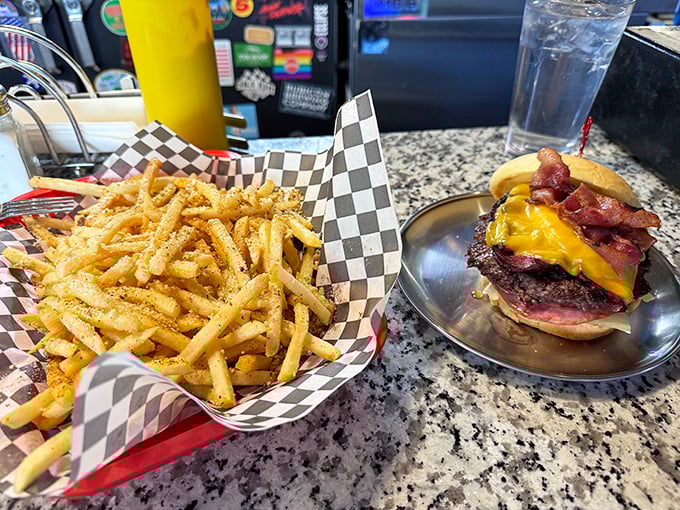 The dynamic duo that dreams are made of. Golden parmesan fries stand guard beside a bacon cheeseburger that demands your full attention.