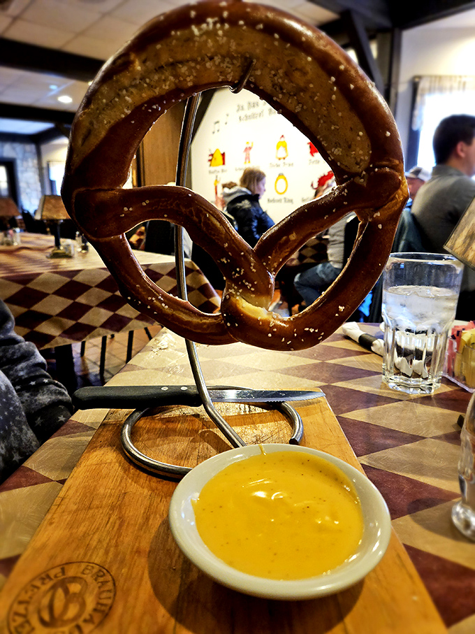 The pretzel stand isn't just functional&mdash;it's theatrical. Like a carb-loaded Cirque du Soleil performer, this pretzel defies gravity while tempting your taste buds.