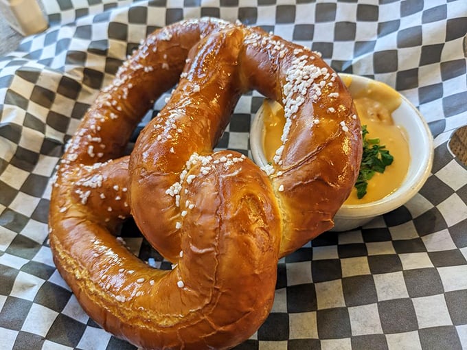The pretzel twist that launched a thousand road trips. That golden-brown exterior is the doorway to happiness; the beer cheese is the welcome committee.