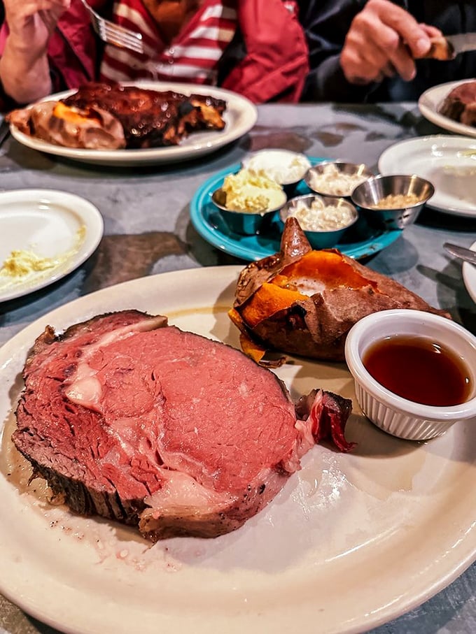 This isn't just prime rib&mdash;it's a carnivore's dream canvas, painted in perfect shades of pink with a sweet potato sidekick stealing some well-deserved spotlight.