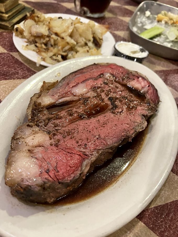 Behold the star of the show: prime rib so perfectly pink in the middle, it makes other steaks look like they need therapy.