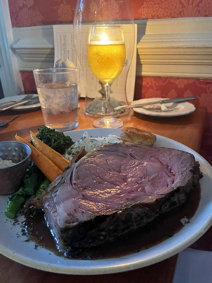 When your prime rib arrives with a moat of savory jus, accompanied by green beans and carrots that actually taste like vegetables should.