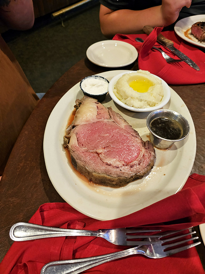 Prime rib with a crater of melted butter in mashed potatoes&mdash;like a volcano of flavor waiting to erupt on your taste buds.