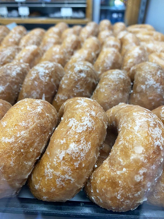 These powdered cake donuts aren't just arranged in rows&mdash;they're lined up like sweet soldiers ready to sacrifice themselves for your enjoyment.