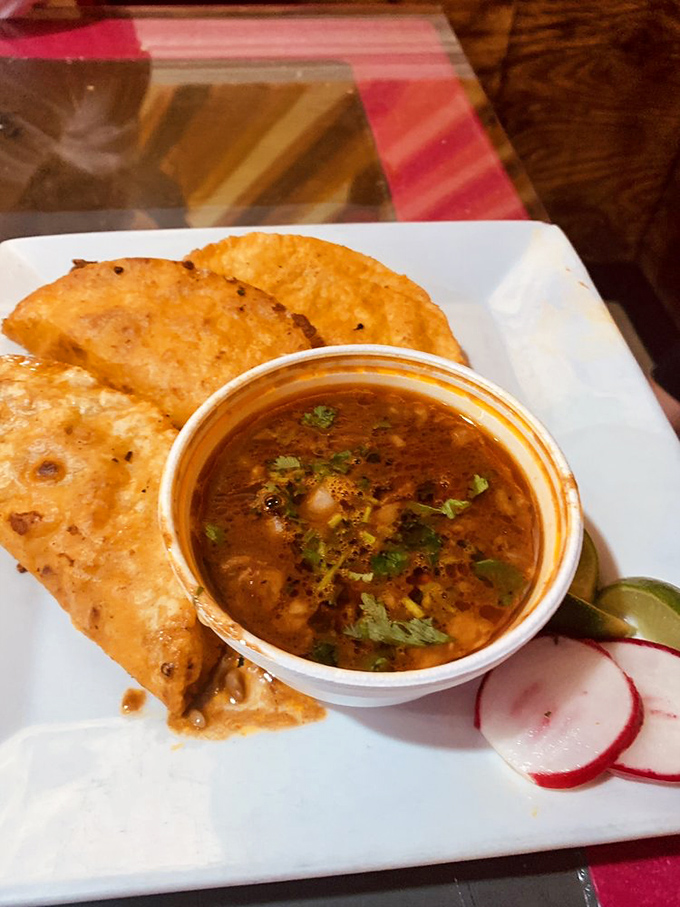 Quesabirria tacos—where crispy meets tender, cheese meets meat, and your taste buds meet their new obsession. That consommé for dipping? Pure genius.