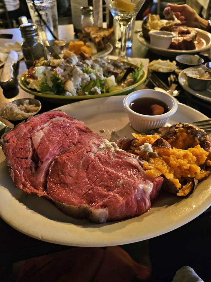 When your prime rib arrives looking like this, conversation stops and appreciative sighs begin. That sweet potato looks like a worthy sidekick.