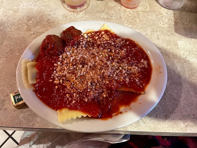 These ravioli pillows deserve their own luxury bedding commercial. Tender pasta pockets swimming in a sea of rich, vibrant sauce.