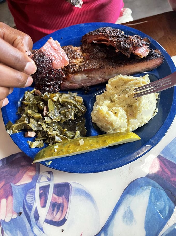 Someone's having a moment with those ribs. The collard greens and potato salad aren't just sides&mdash;they're supporting actors deserving their own Oscar.