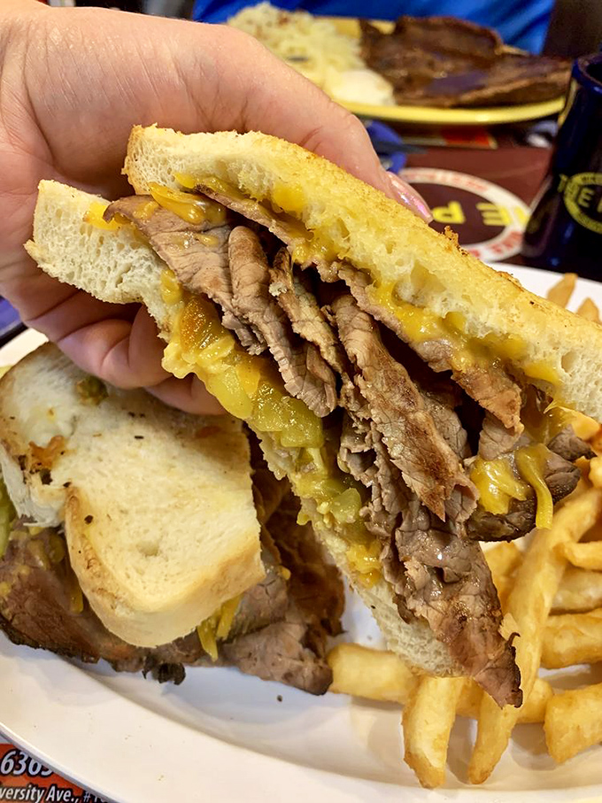 This isn't just a sandwich&mdash;it's an architectural marvel of beef, cheese, and bread that demands to be photographed before it's devoured.