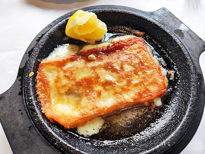 Saganaki: Where cheese meets fire and creates magic. That golden crust is what dreams&mdash;and slightly elevated cholesterol&mdash;are made of.