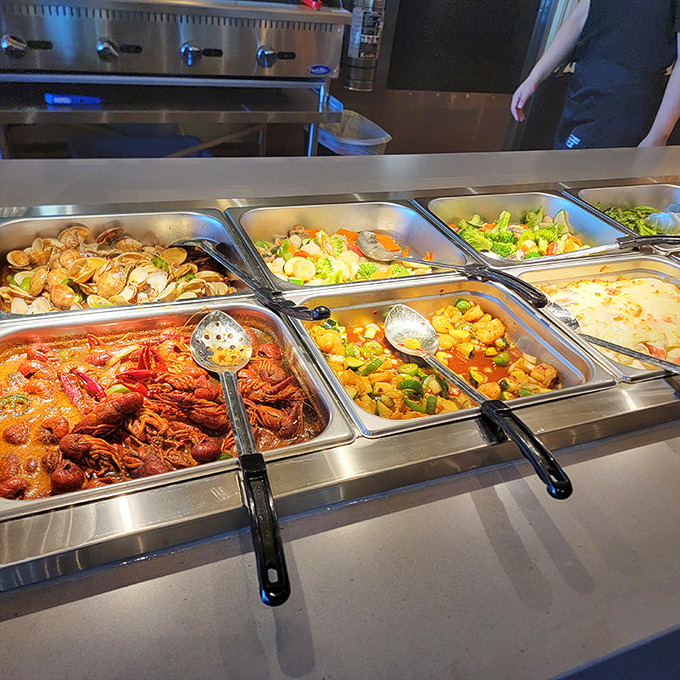 Seafood heaven awaits! Those crawfish look like they're having a pool party in sauce, and everyone's invited.