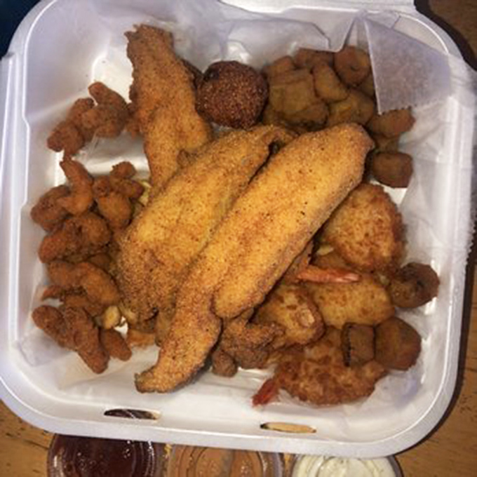 The seafood sampler isn't just a meal, it's an expedition across the best of Southern waters, with each golden morsel telling its own delicious story.