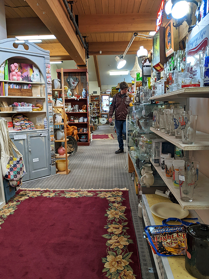 Glassware galore lines the pathway to more discoveries. Each aisle promises its own adventure in this labyrinth of nostalgia. Photo