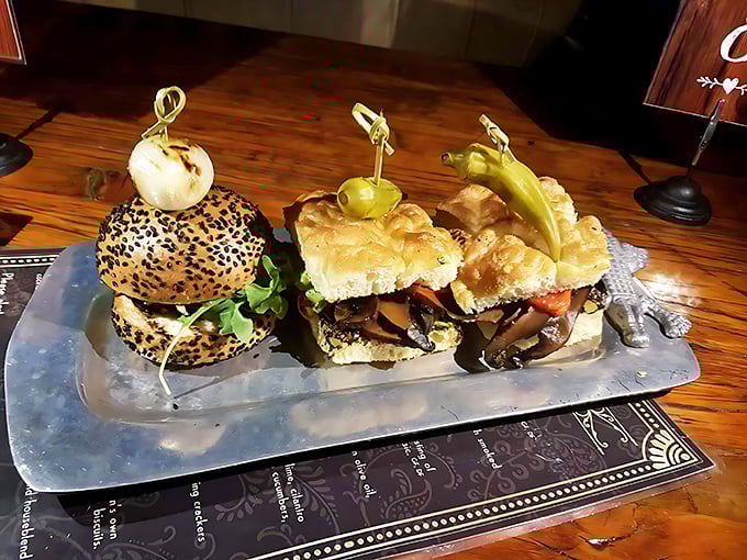 These aren't just sliders&mdash;they're tiny ambassadors of flavor, each one perched on its silver throne like delicious royalty waiting for an audience.