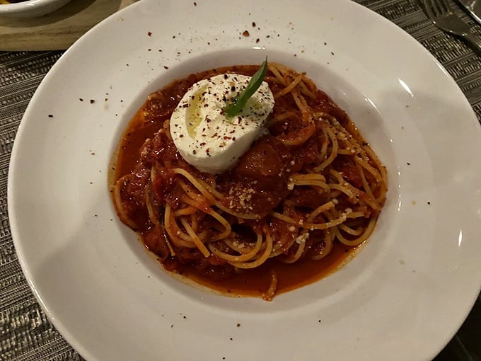 Simple ingredients, transcendent flavor. Their signature spaghetti proves that perfection doesn't need complexity&mdash;just respect for tradition.