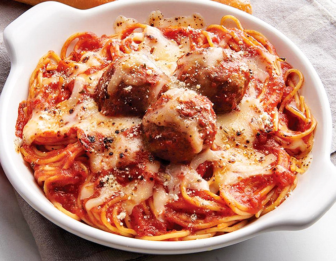 The holy trinity of comfort: spaghetti, meatballs, and melted cheese. This isn't just dinner—it's a warm hug for your soul.