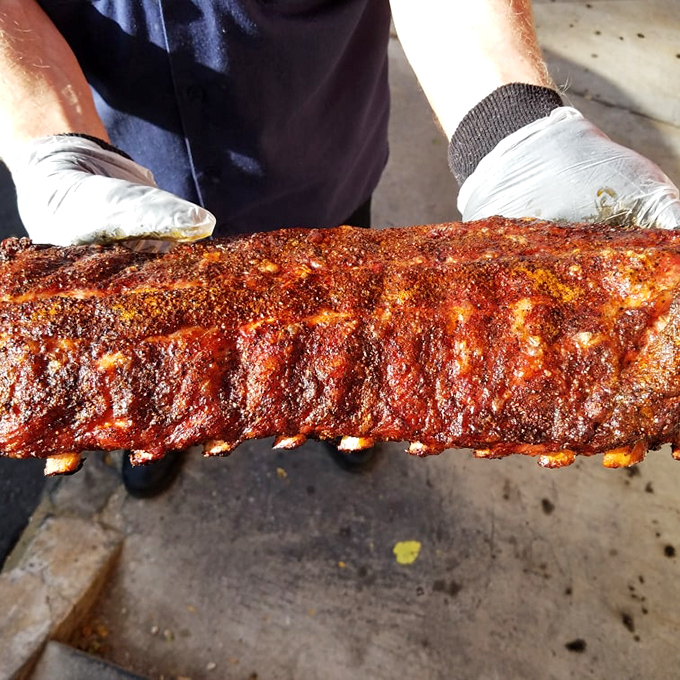 Behold the rack that launched a thousand road trips. That bark, that color&mdash;it's the Sistine Chapel of smoked meat artistry.