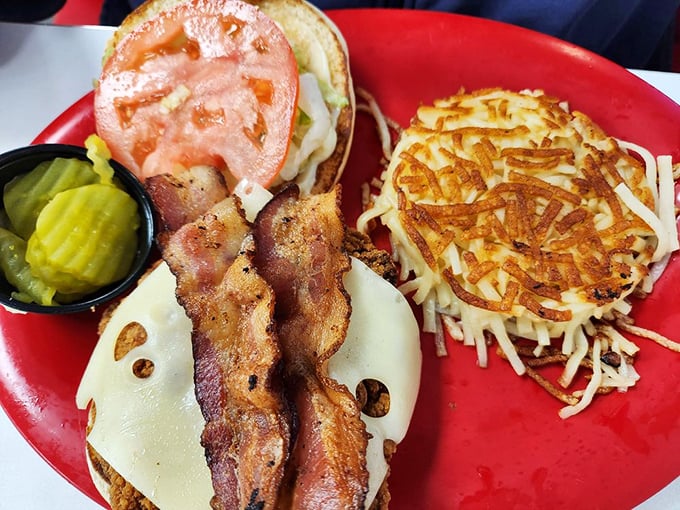 This isn't just a sandwich; it's architecture. Crispy bacon, melty cheese, and those legendary hash browns create the Taj Mahal of lunch options.