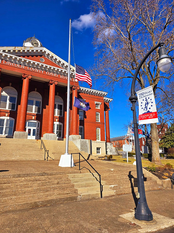 The Lincoln County Courthouse stands proud, a red-brick testament to when public buildings were designed to inspire, not just function.