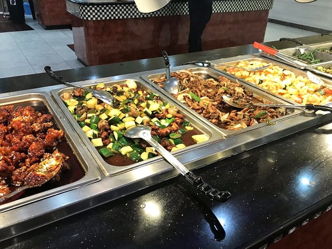 The stir-fry station delivers that perfect symphony of vegetables and proteins, where General Tso meets broccoli in a sauce that might just make you forget your table manners.