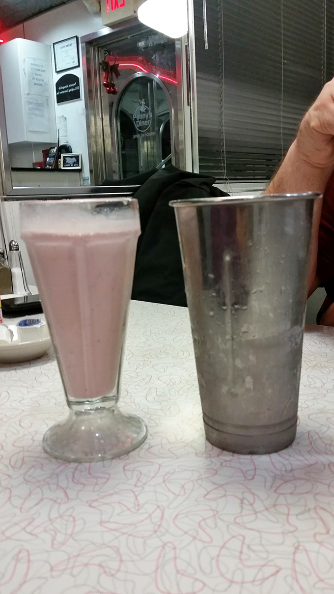 The classic strawberry shake comes with its mixing cup, because one glass simply isn't enough of this pink perfection. Twice the container, twice the joy!