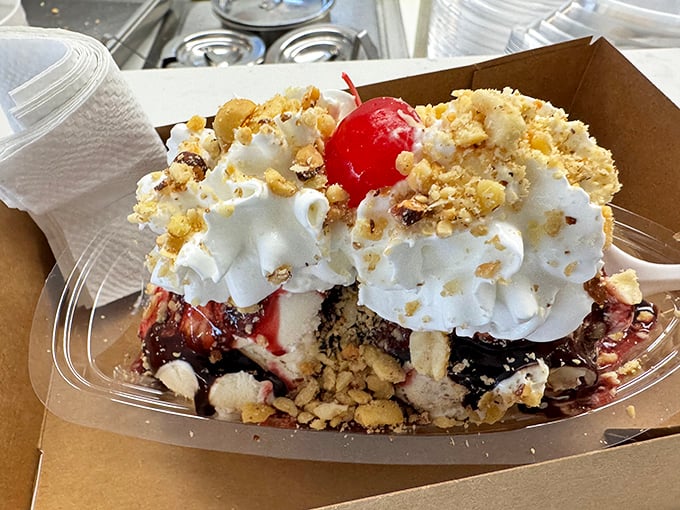 Behold the banana split in all its glory&mdash;where chocolate, vanilla, and what appears to be taro ice cream unite under a canopy of whipped cream.
