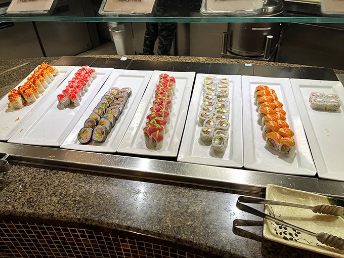 Sushi rolls lined up like colorful soldiers ready for your selection. Each piece is a little work of art &ndash; almost too pretty to eat. Almost.