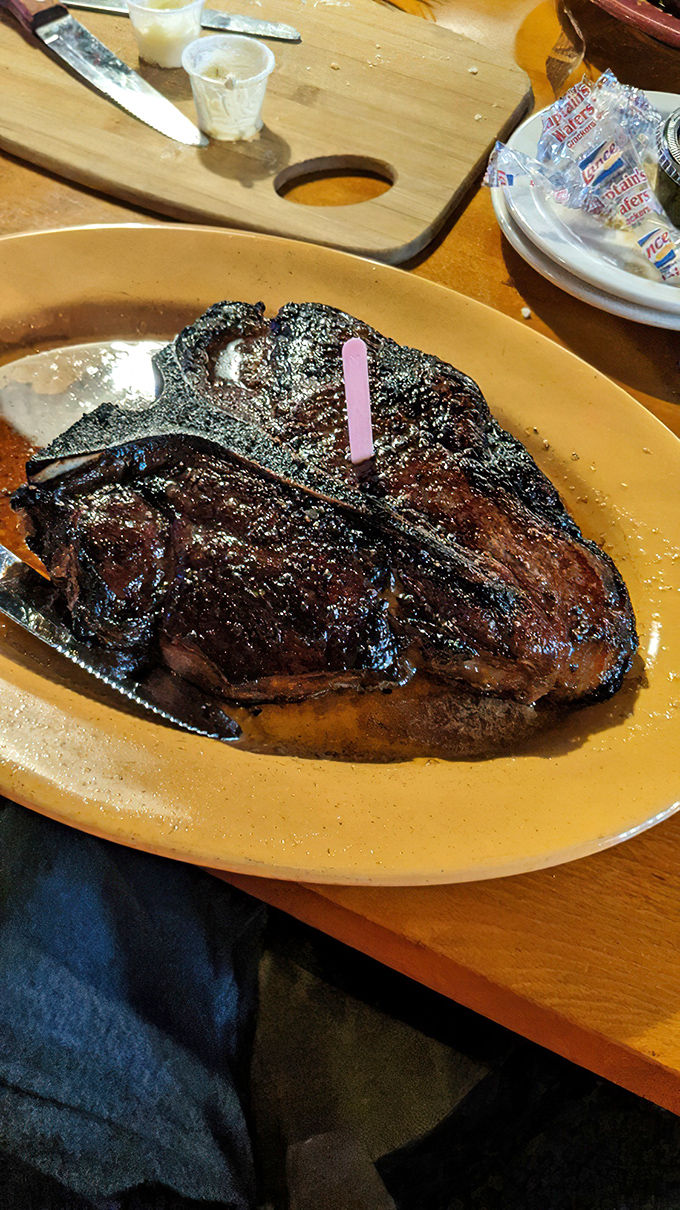 The T-bone arrives like a meaty work of art, with that signature pink temperature marker standing guard over beefy perfection.