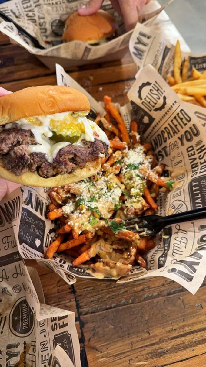 The Hawaii Five-O Burger and loaded fries&mdash;a tropical vacation and comfort food therapy session all on one newspaper-lined tray.