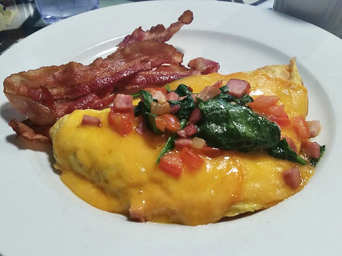 The perfect marriage of crispy bacon and cheese-draped eggs. That spinach makes it healthy, right? At least that's what I tell myself.