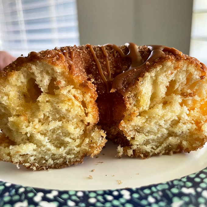 The perfect cake donut reveals its soul&mdash;a tender, moist interior that makes you understand why people use words like "crumb structure" with religious reverence.